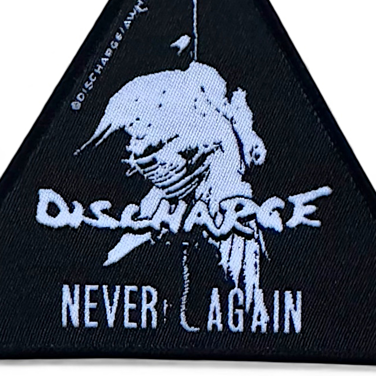 DISCHARGE “Never Again” (Black Border) WOVEN PATCH – Iron Corpse